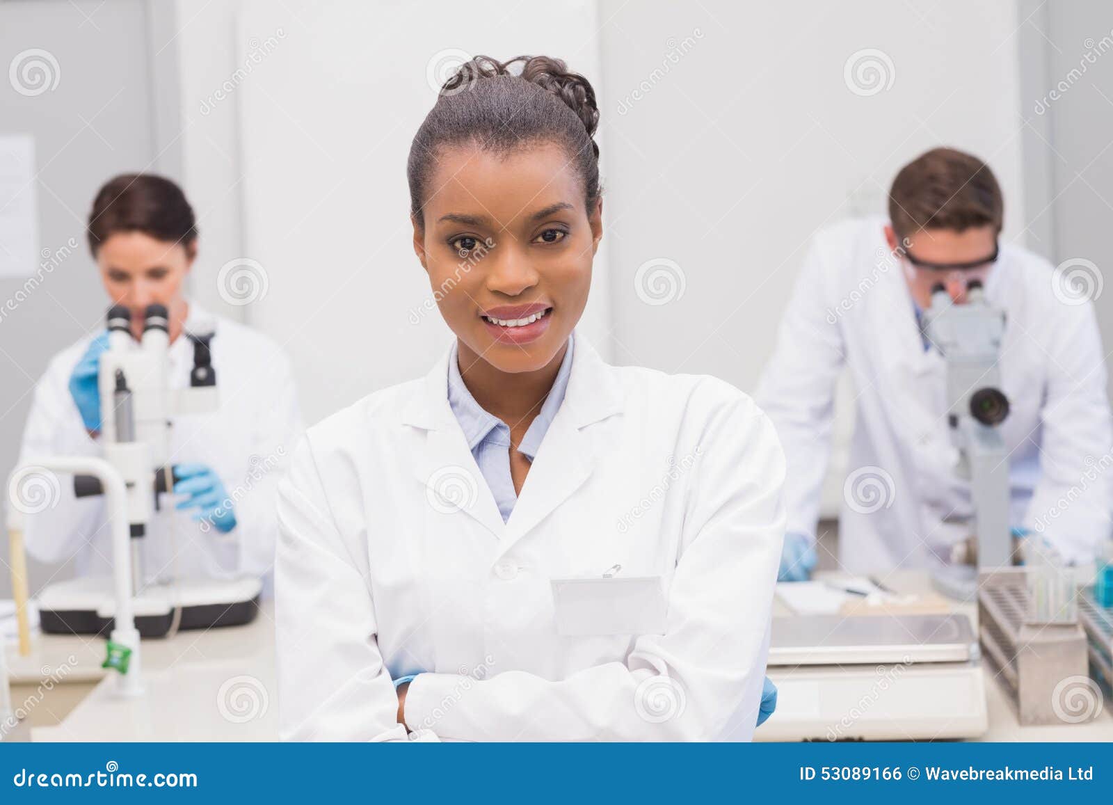 Happy Scientist Smiling at Camera with Arms Crossed Stock Photo - Image ...