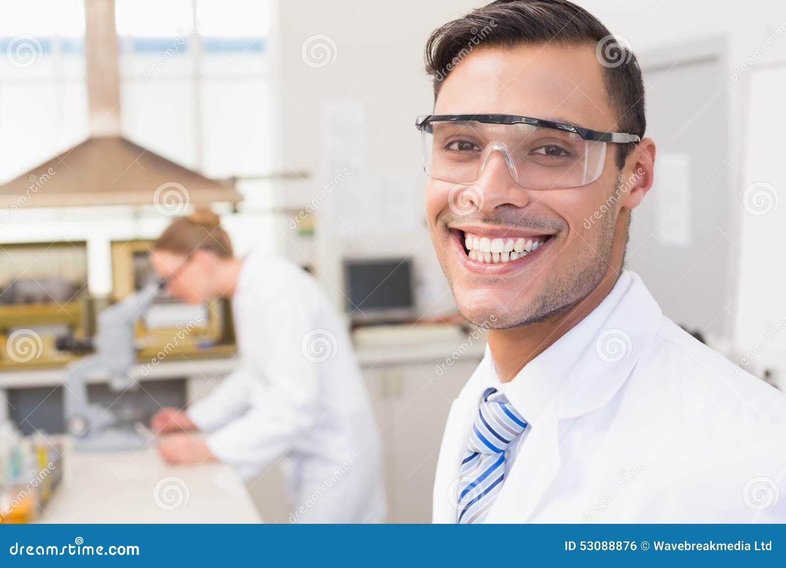 Happy Scientist Smiling at Camera Stock Photo - Image of coat ...