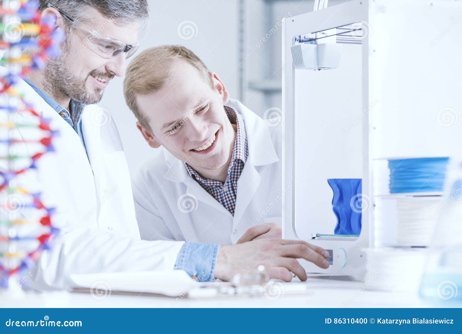 Happy Scientist Working at Laboratory Stock Photo - Image of chemical ...