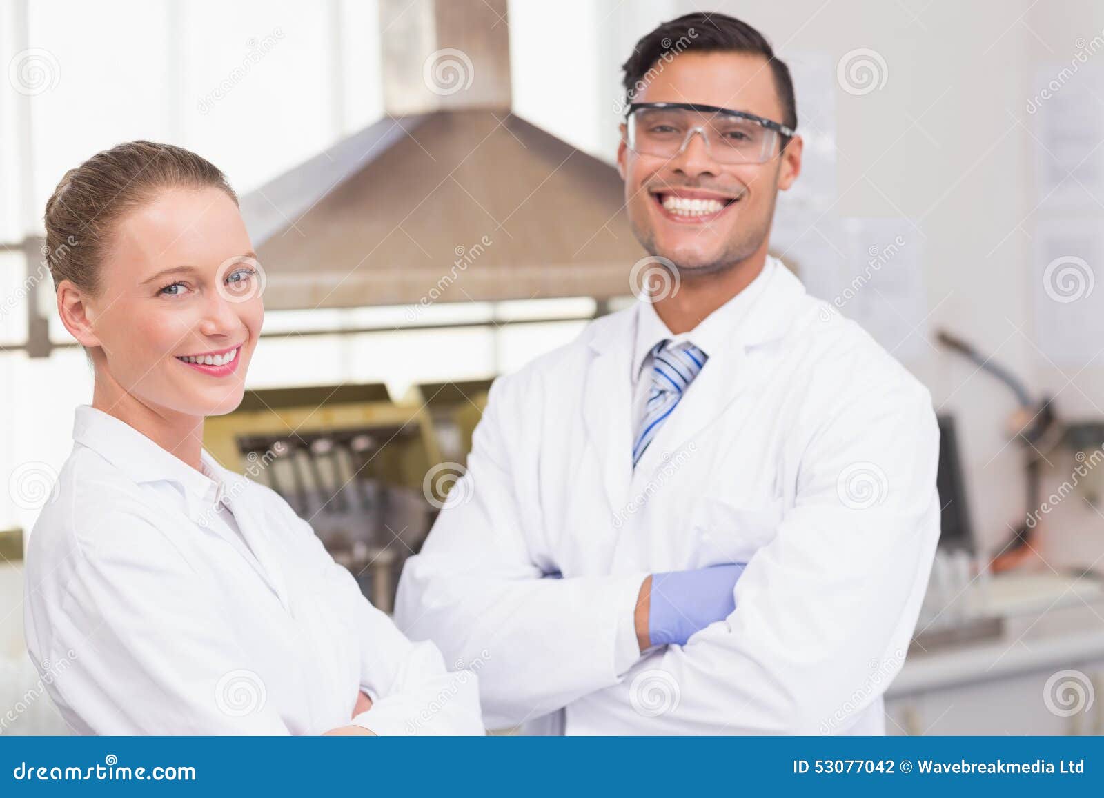 Happy Scientists Smiling at Camera with Arms Crossed Stock Photo ...