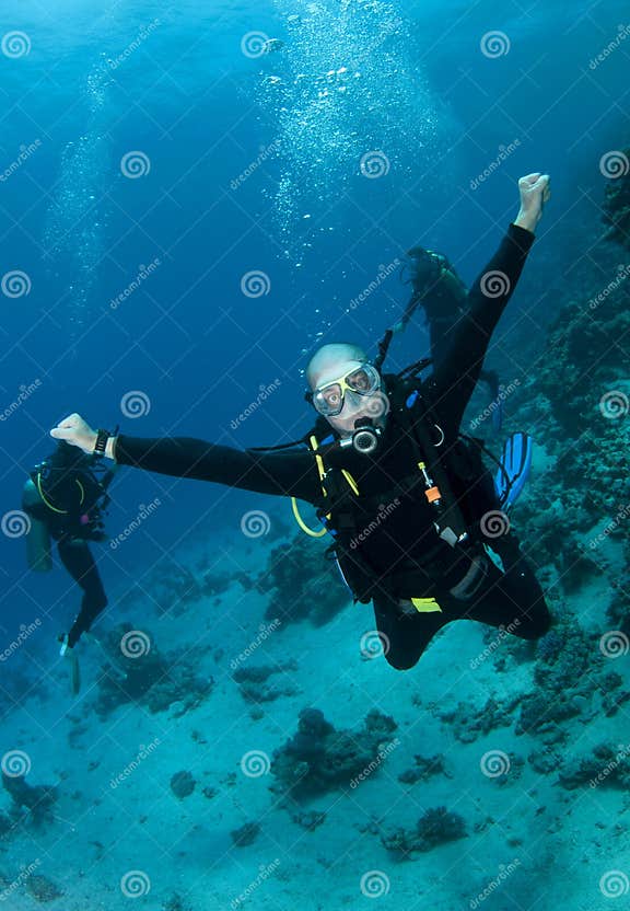 Happy scuba diver stock photo. Image of swimming, environment - 15906818