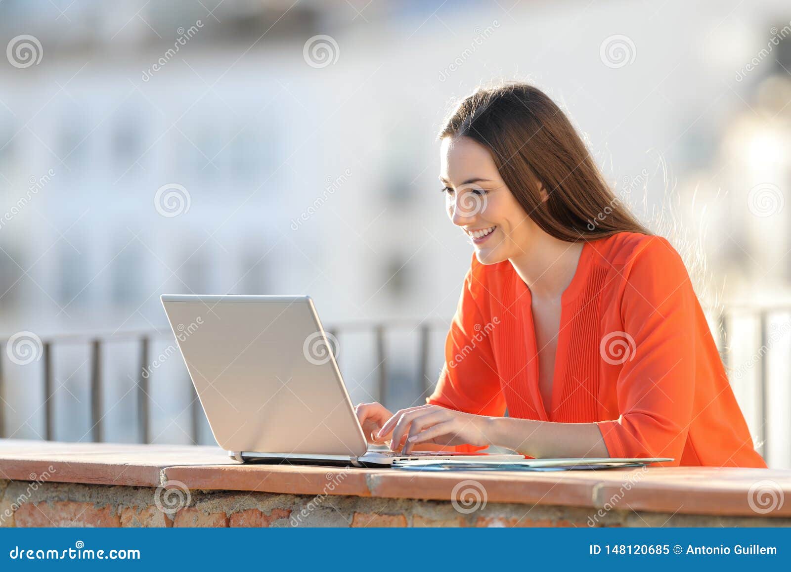 Happy Self Employed Working with a Laptop in a Balcony Stock Image ...