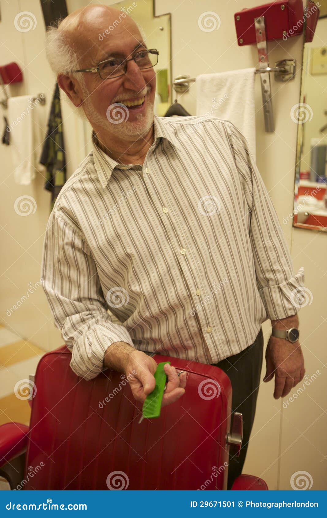 Happy Senior Barber Standing by Seat while Looking Away Stock Image ...