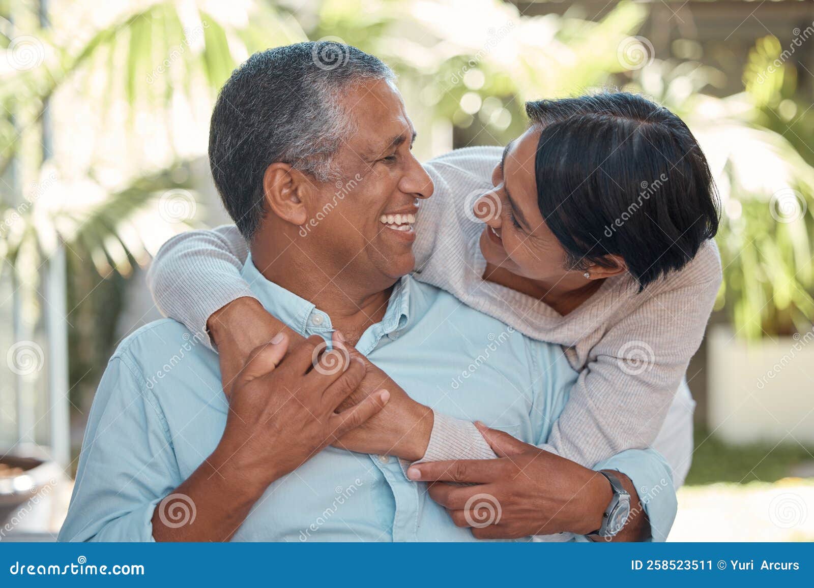 Happy Senior Couple Hug In Garden Love And Romance In Retirement