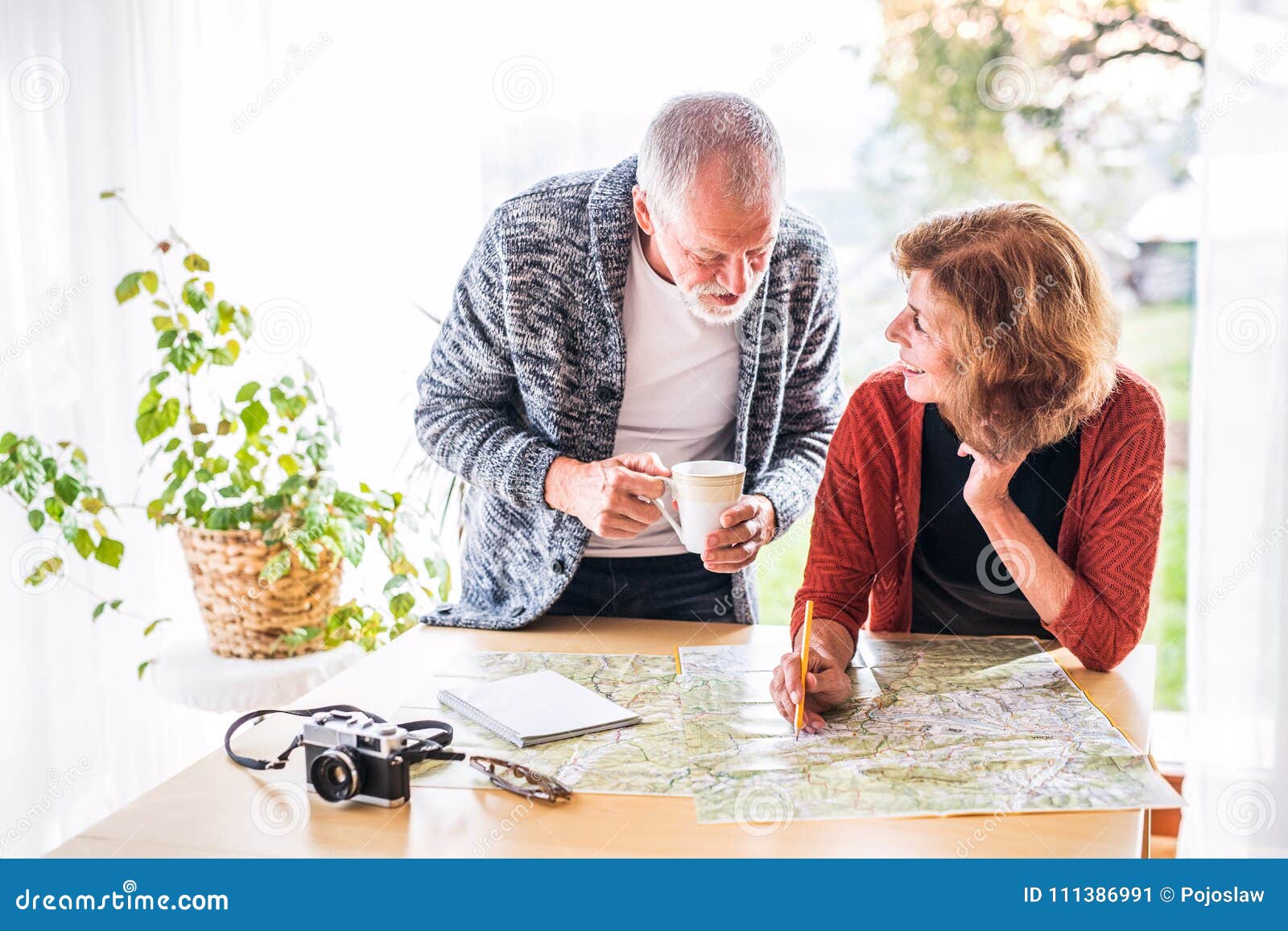 Senior Couple with Map at Home, Making Plans. Stock Image - Image of ...