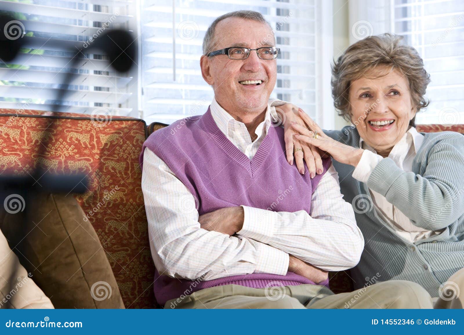 Happy Senior Couple Sitting Together on Couch Stock Photo - Image of ...