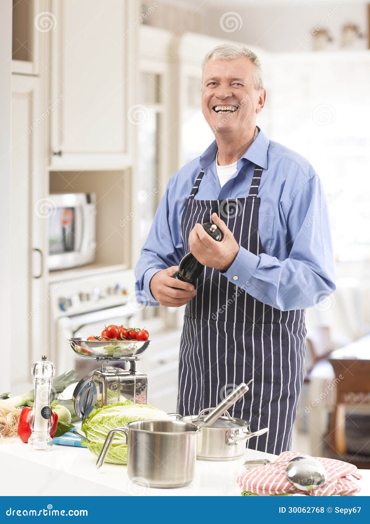 Senior Man in the Kitchen stock photo. Image of plus - 30062768