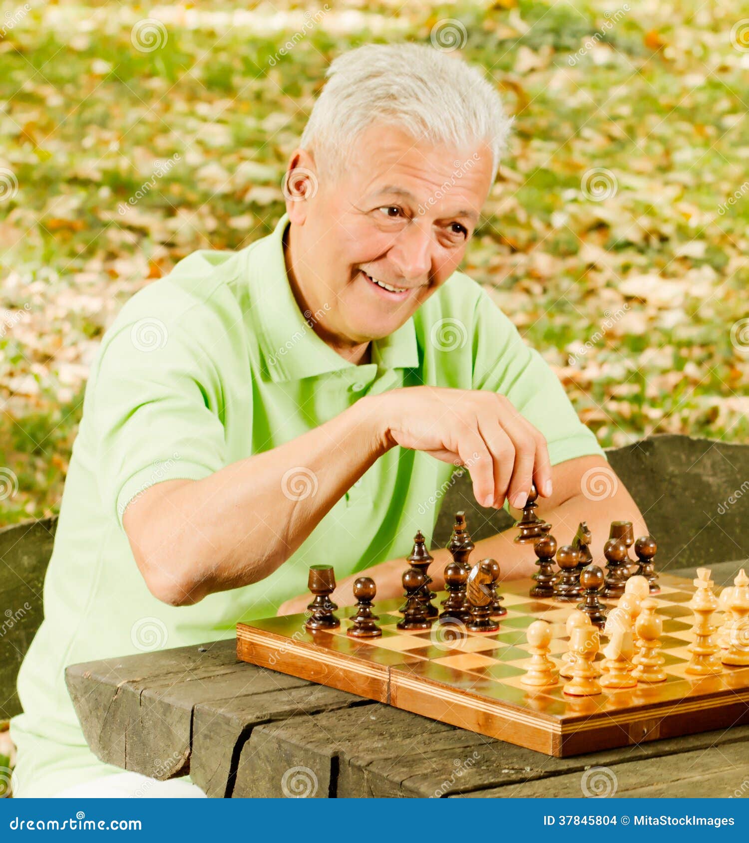 Happy Senior Man Playing Chess Stock Photo - Image of life, play: 37845804