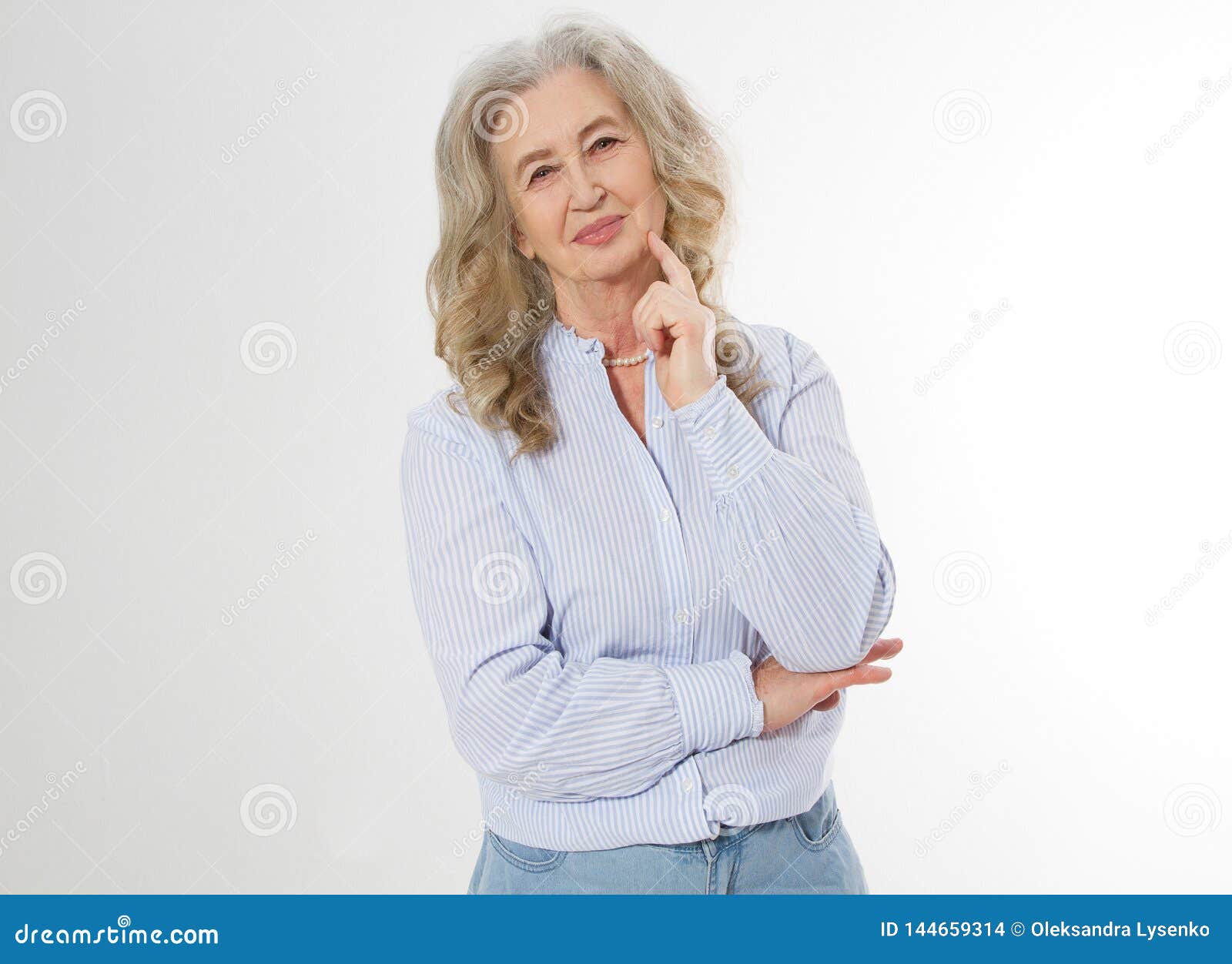 Happy Senior Woman With Crossed Arms Isolated On White Background