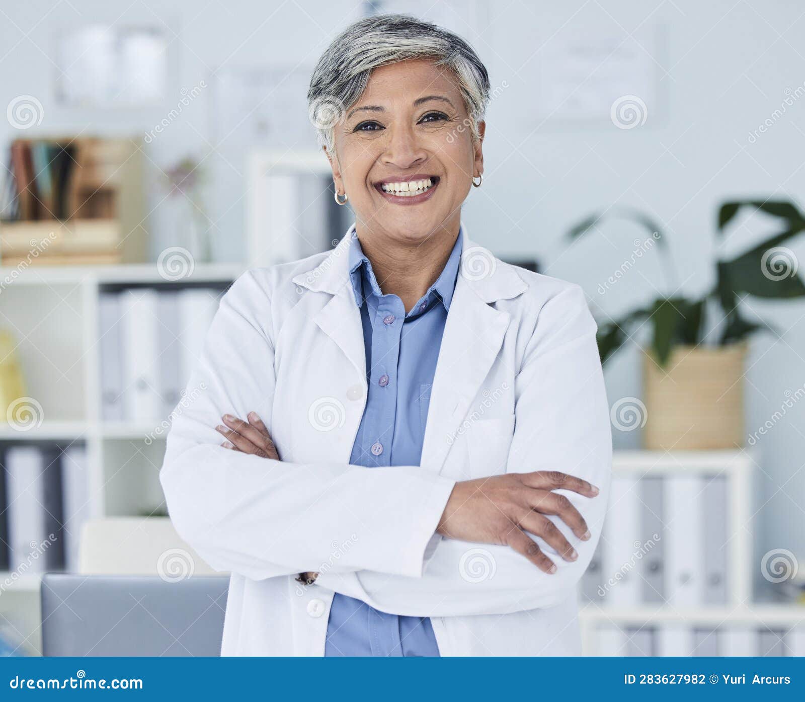Happy Senior Woman Portrait And Doctor With Arms Crossed In Confidence