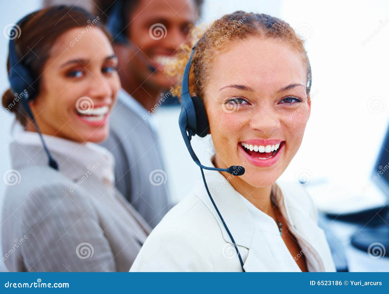 Happy Service Desk Team Wearing Headsets Stock Photo - Image of natural ...
