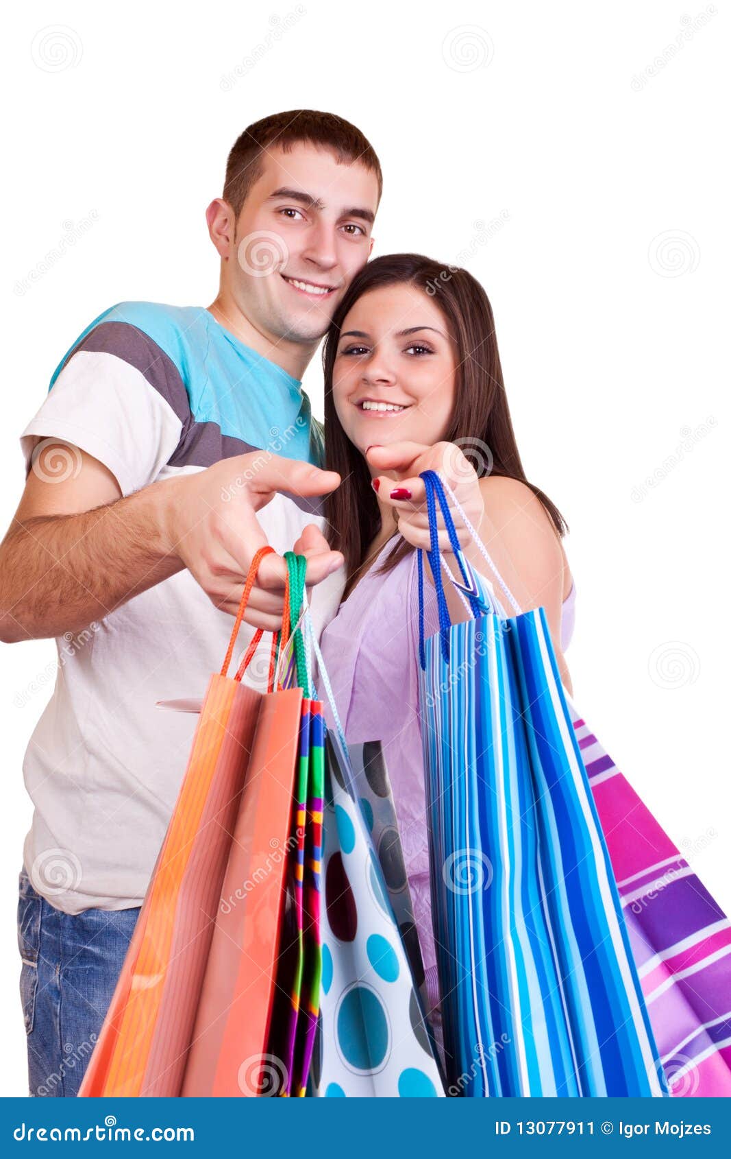 Happy shoper couple stock image. Image of color, colorful - 13077911
