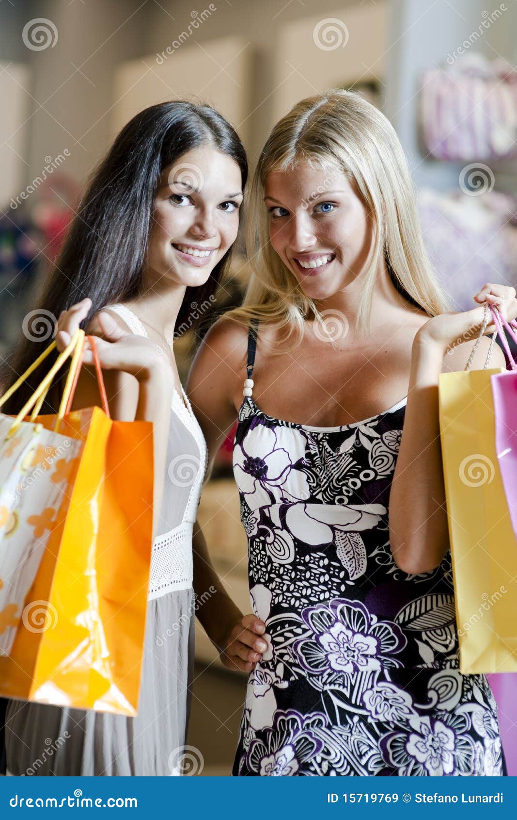 Happy shoppers stock image. Image of beauty, people, brown - 15719769