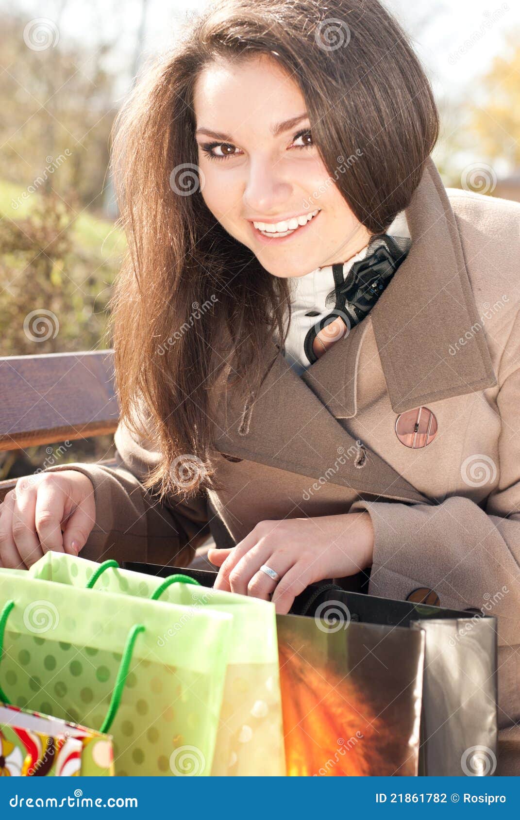 Happy Shopping: Woman Checking Her Purchase Stock Photo - Image of ...
