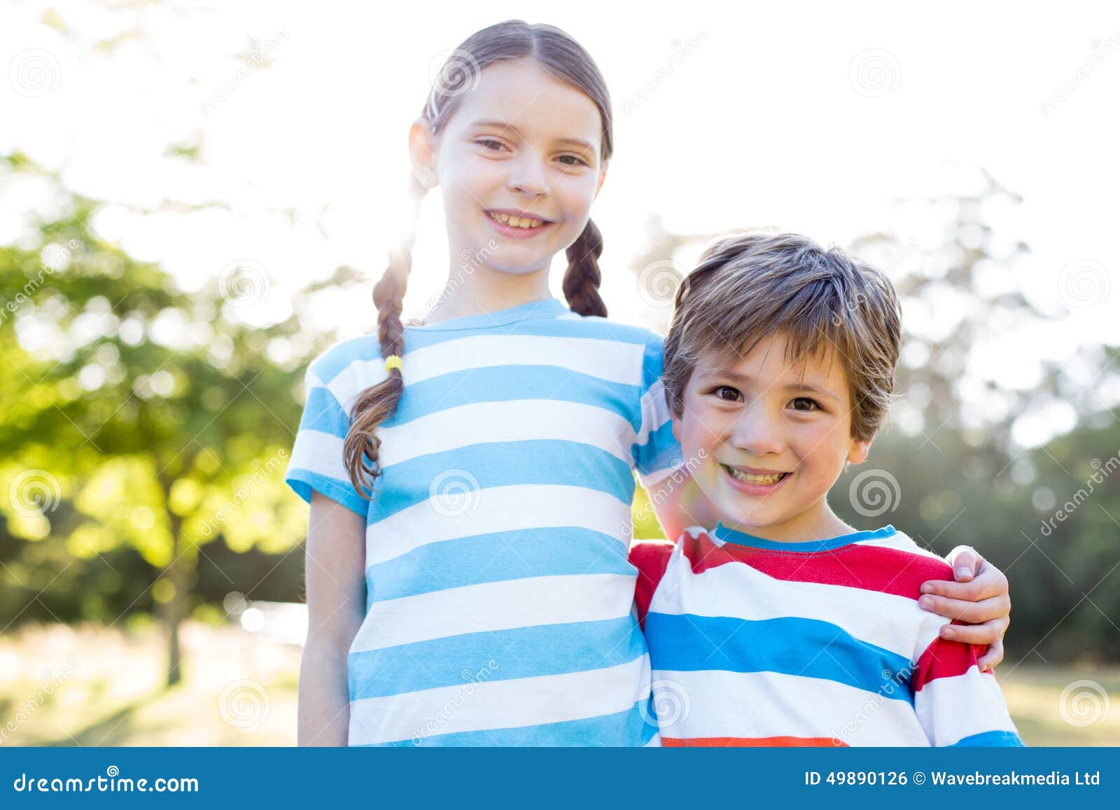 Happy Siblings Smiling at Camera Stock Photo - Image of people, child ...
