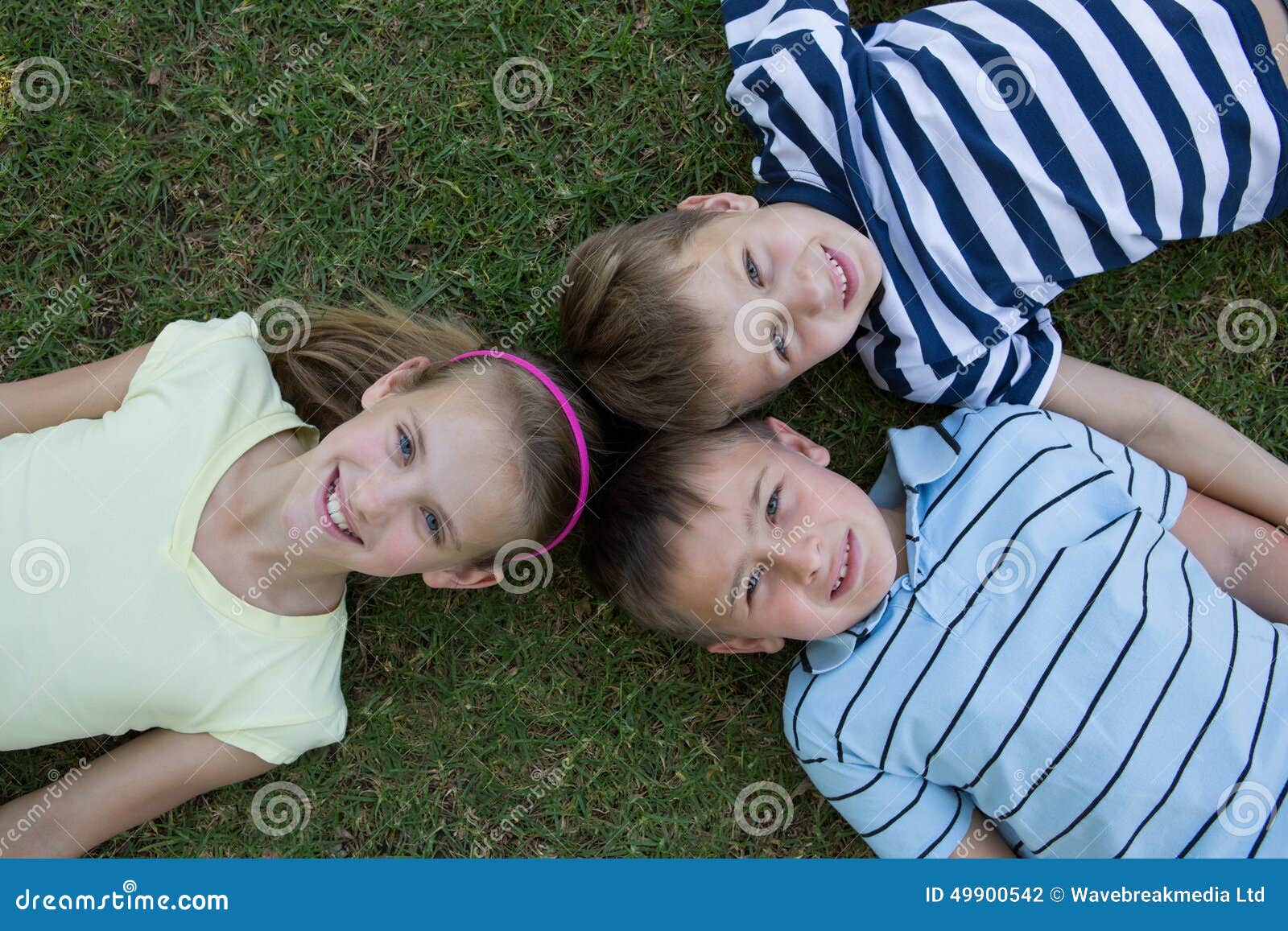 Happy Siblings Smiling at Camera Together Stock Photo - Image of ...