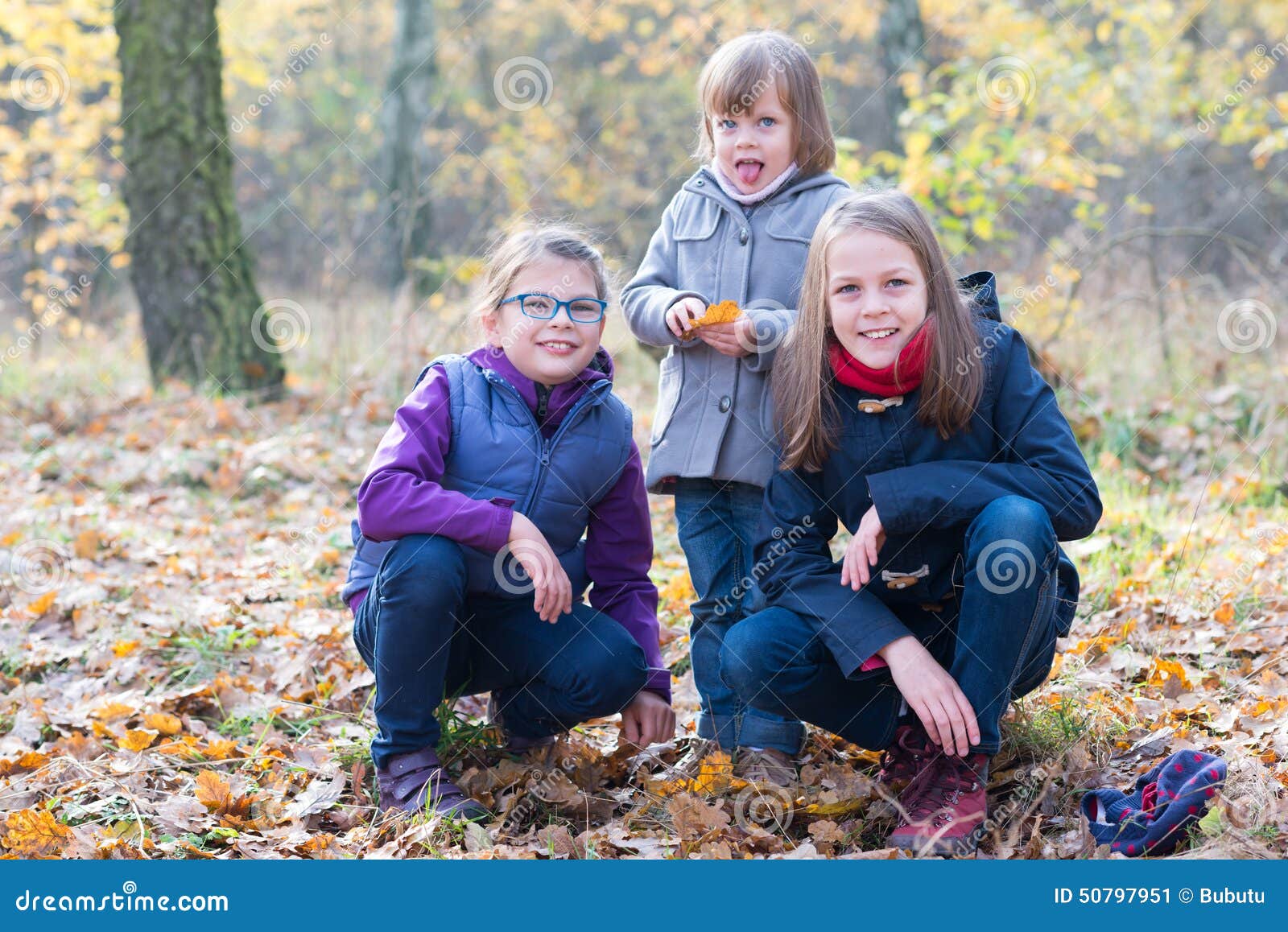Happy Siblings - Three Sisters in the Autumnal Forest Smiling Stock ...