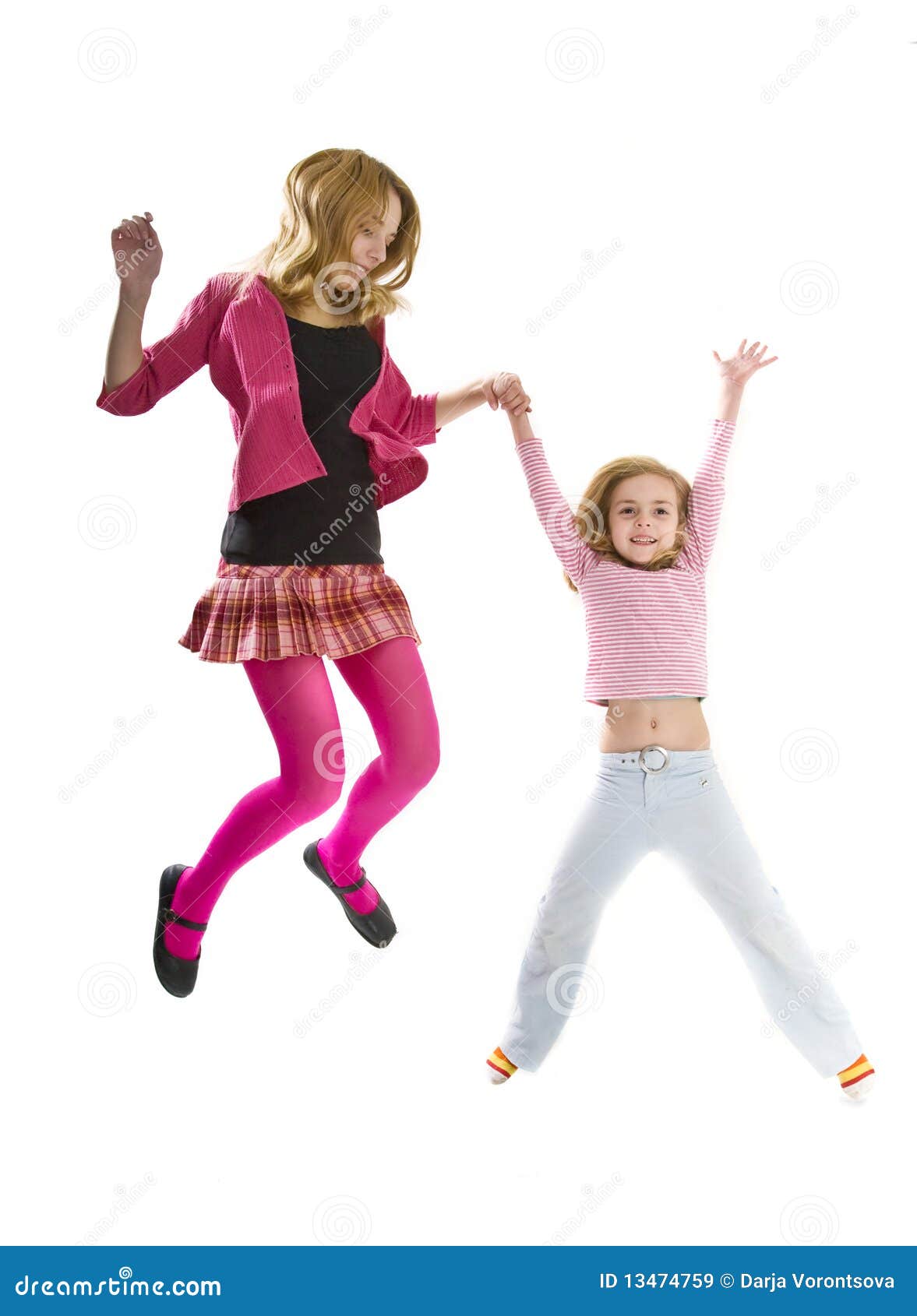 Happy Sisters Jumping Together Stock Image - Image of young, healthy ...