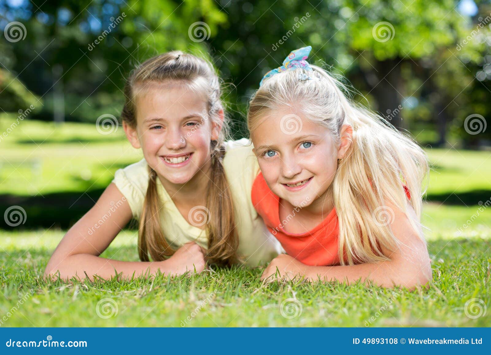 Happy Sisters Smiling at Camera Stock Photo - Image of smiling ...