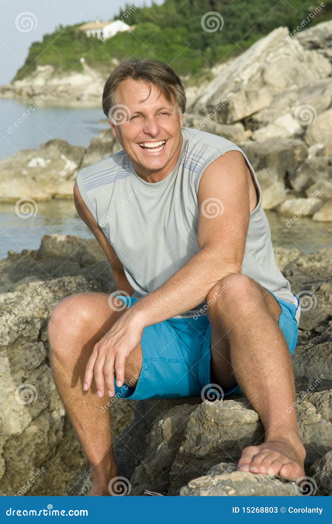 Happy sitting on a rock stock image. Image of cheerful - 15268803
