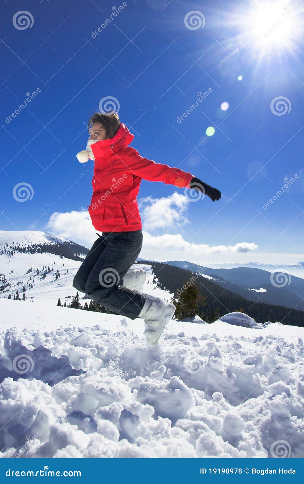 Happy Skiing Girl Jumping in Snow Stock Photo - Image of female ...