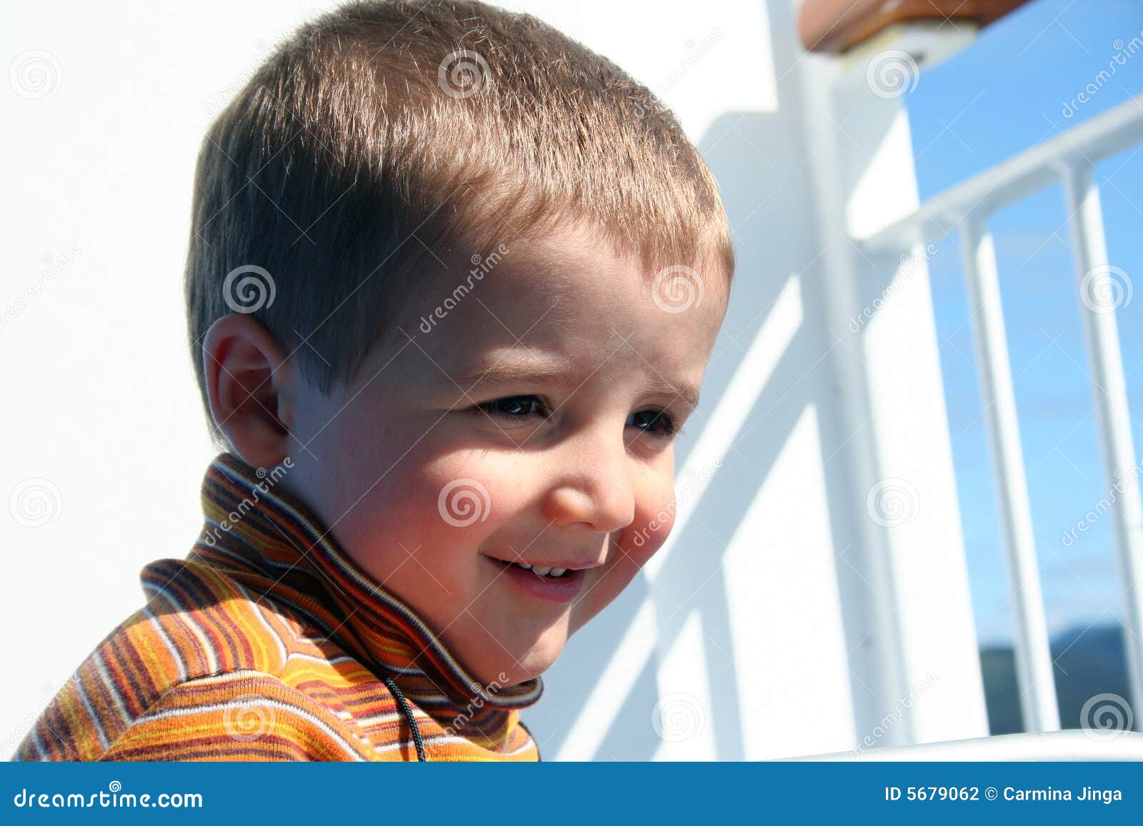 Happy small boy stock photo. Image of peek, child, blond - 5679062