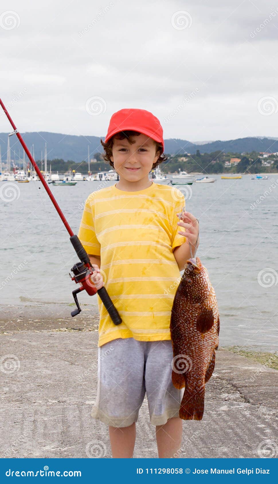 Happy Small Fisherman with a Big Fish Stock Photo - Image of portrait ...