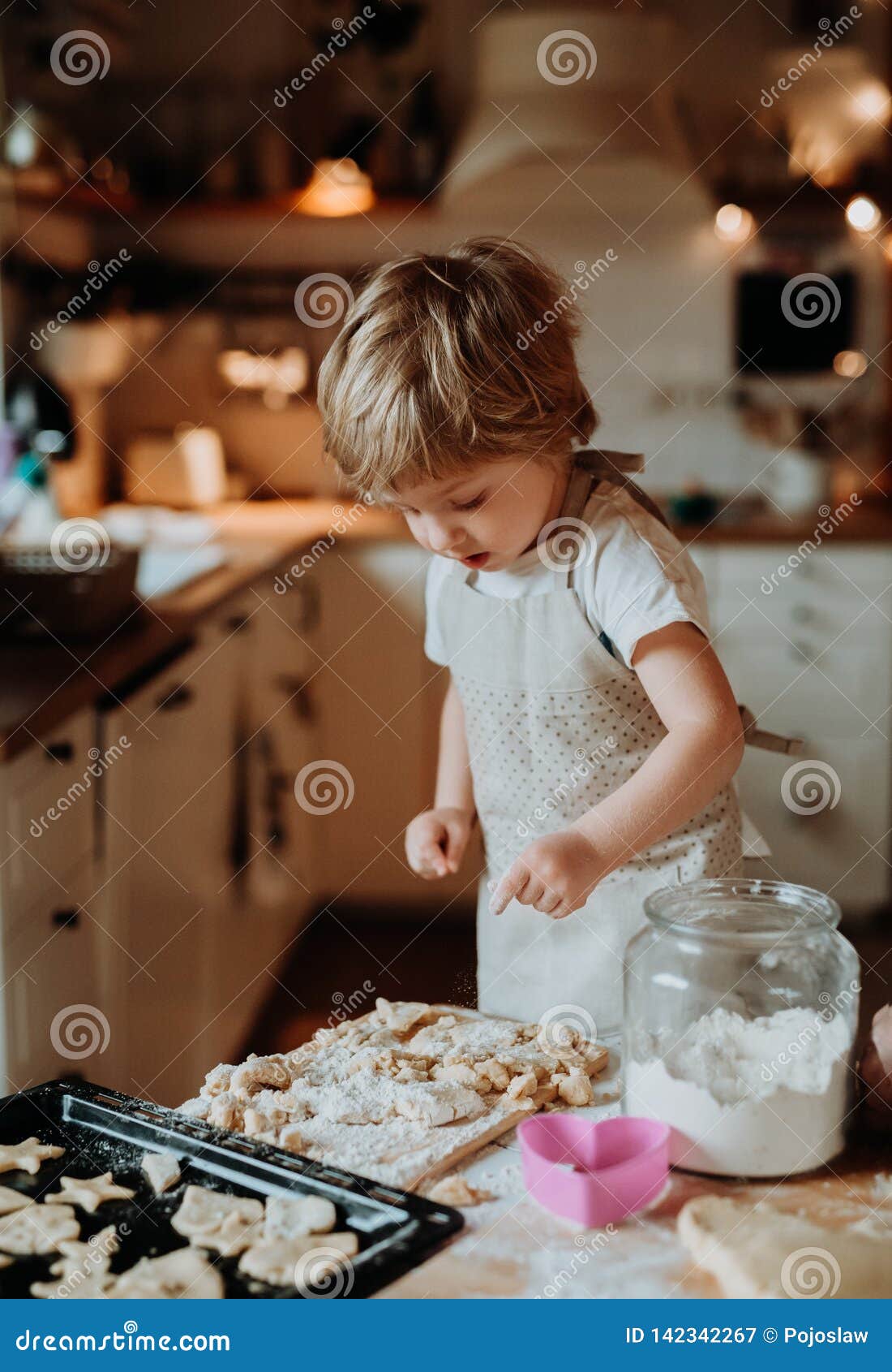 A Happy Small Toddler Boy Making Cakes at Home. Stock Image - Image of ...