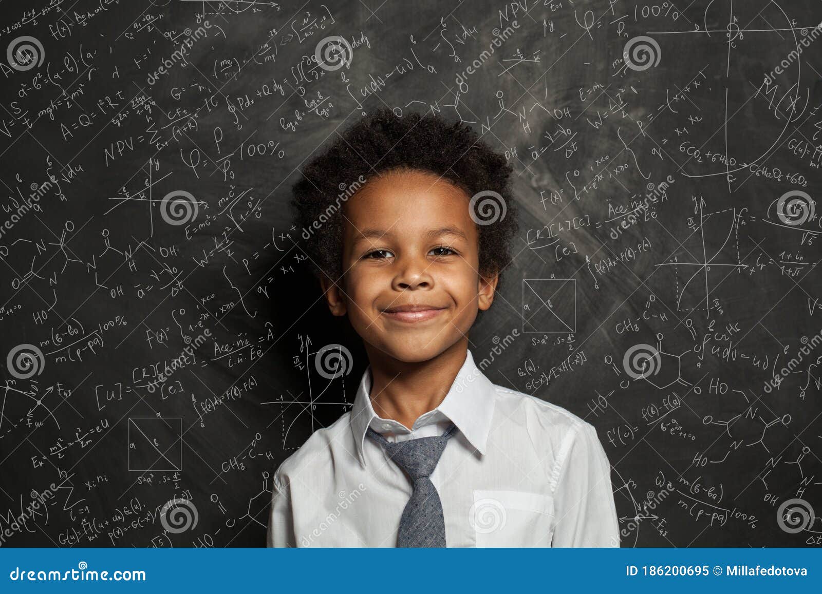 Happy Smart Black Child Student On Blackboard Background With Science ...