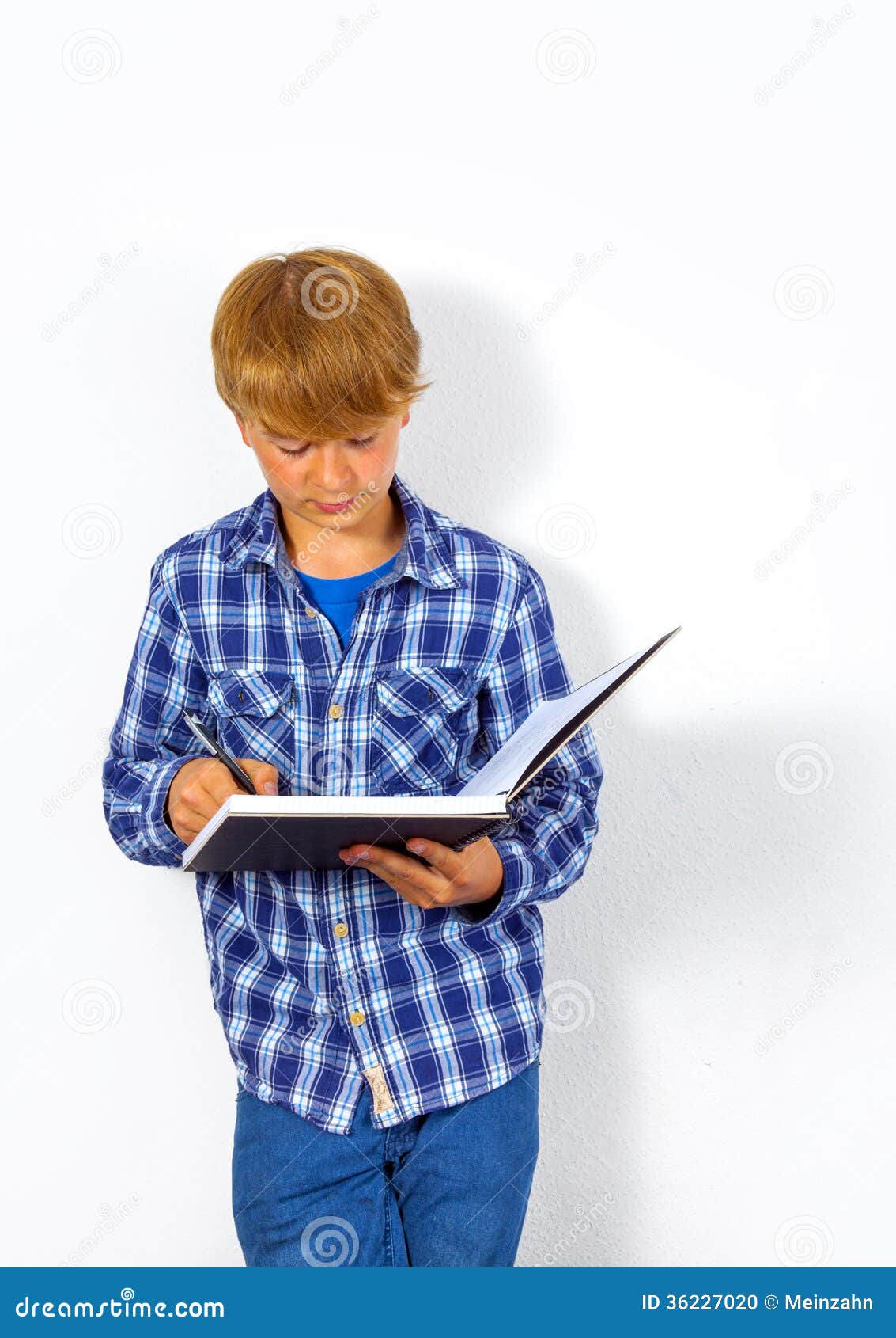 Happy Smart Boy is Writing into Stock Photo - Image of phone, beautiful ...