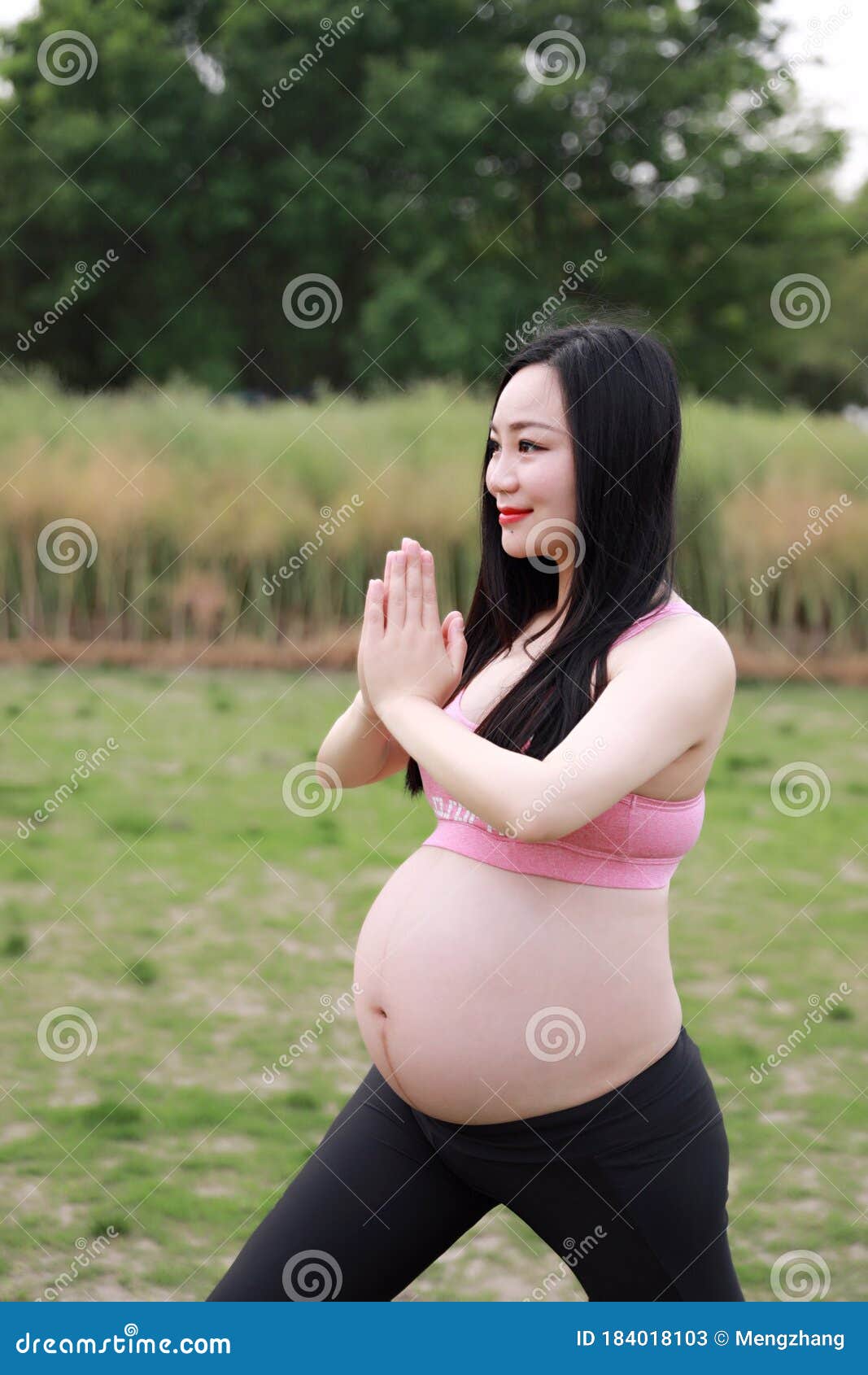 Happy Smile Asian Chinese Pregnant Woman In Yoga Dress Do Meditation In