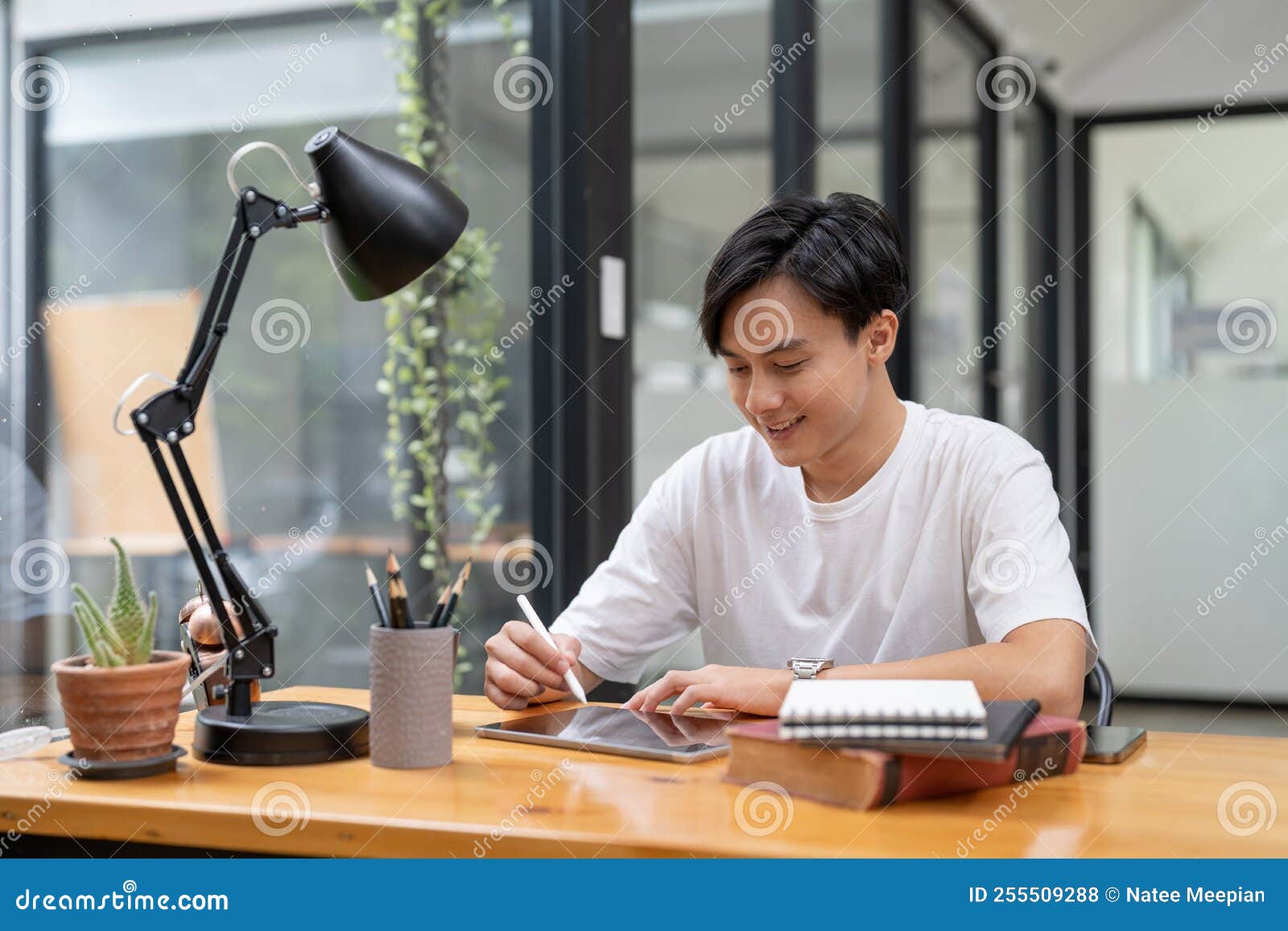 Happy Smiling Asian Student Using Digital Tablet Computer. Online ... Happy Smiling Asian Student Using Digital Tablet Computer. Online ...