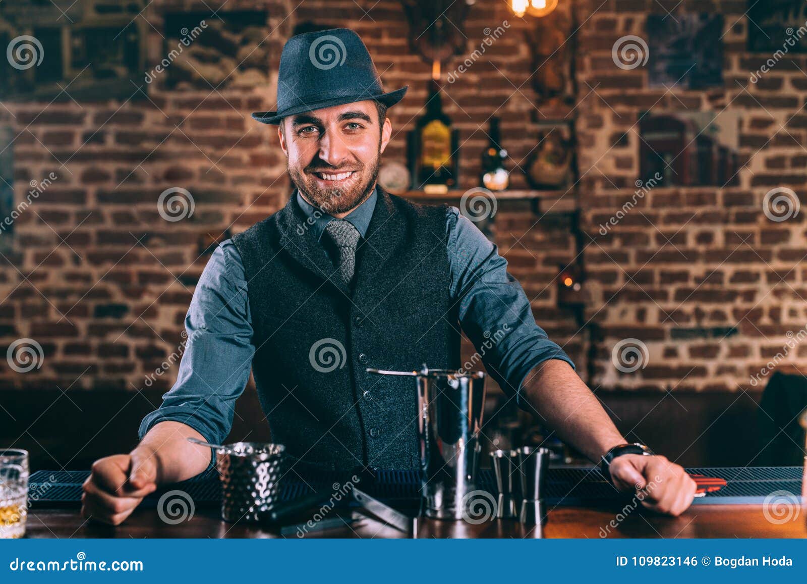 Happy and Smiling Bartender Preparing Cocktails and Enjoying Working at ...