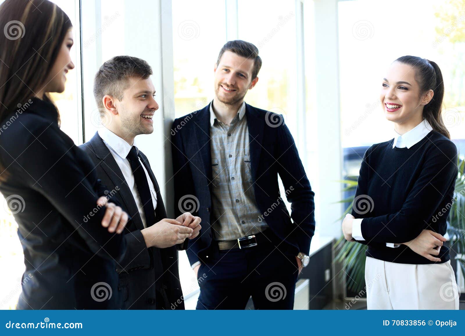 Happy Smiling Business Team in Office Stock Photo - Image of group ...
