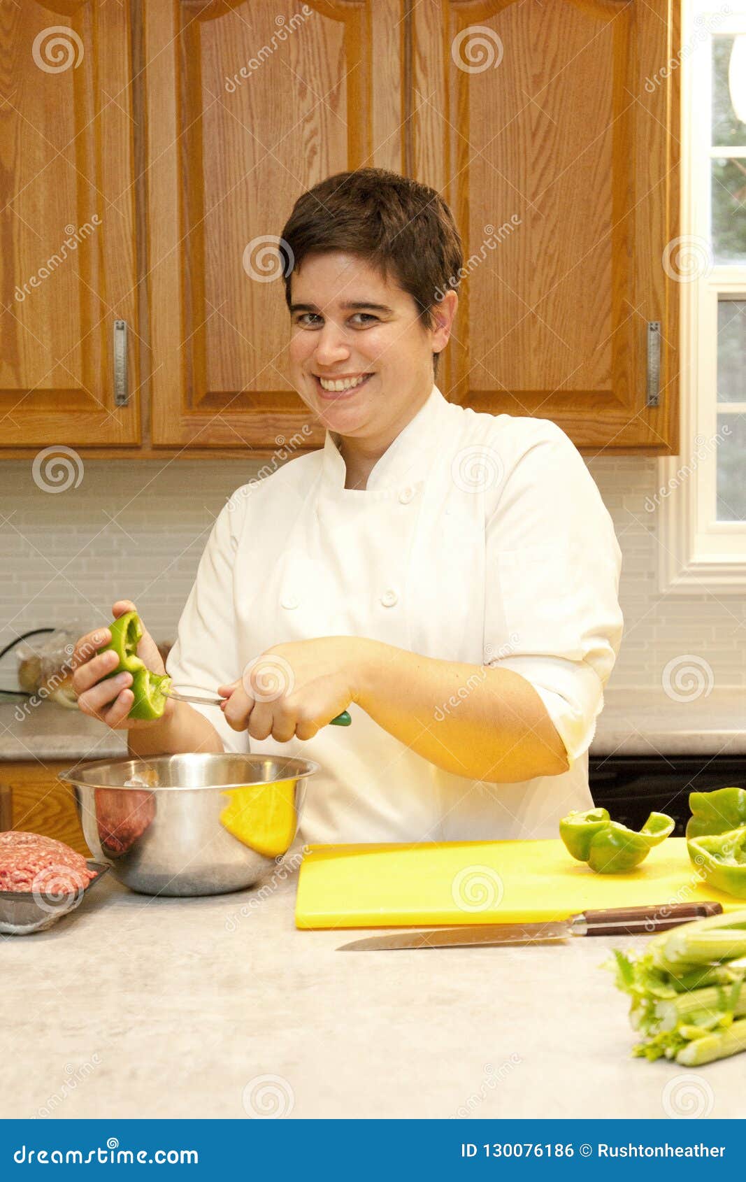 Smiling chef at home stock photo. Image of bell, green - 130076186
