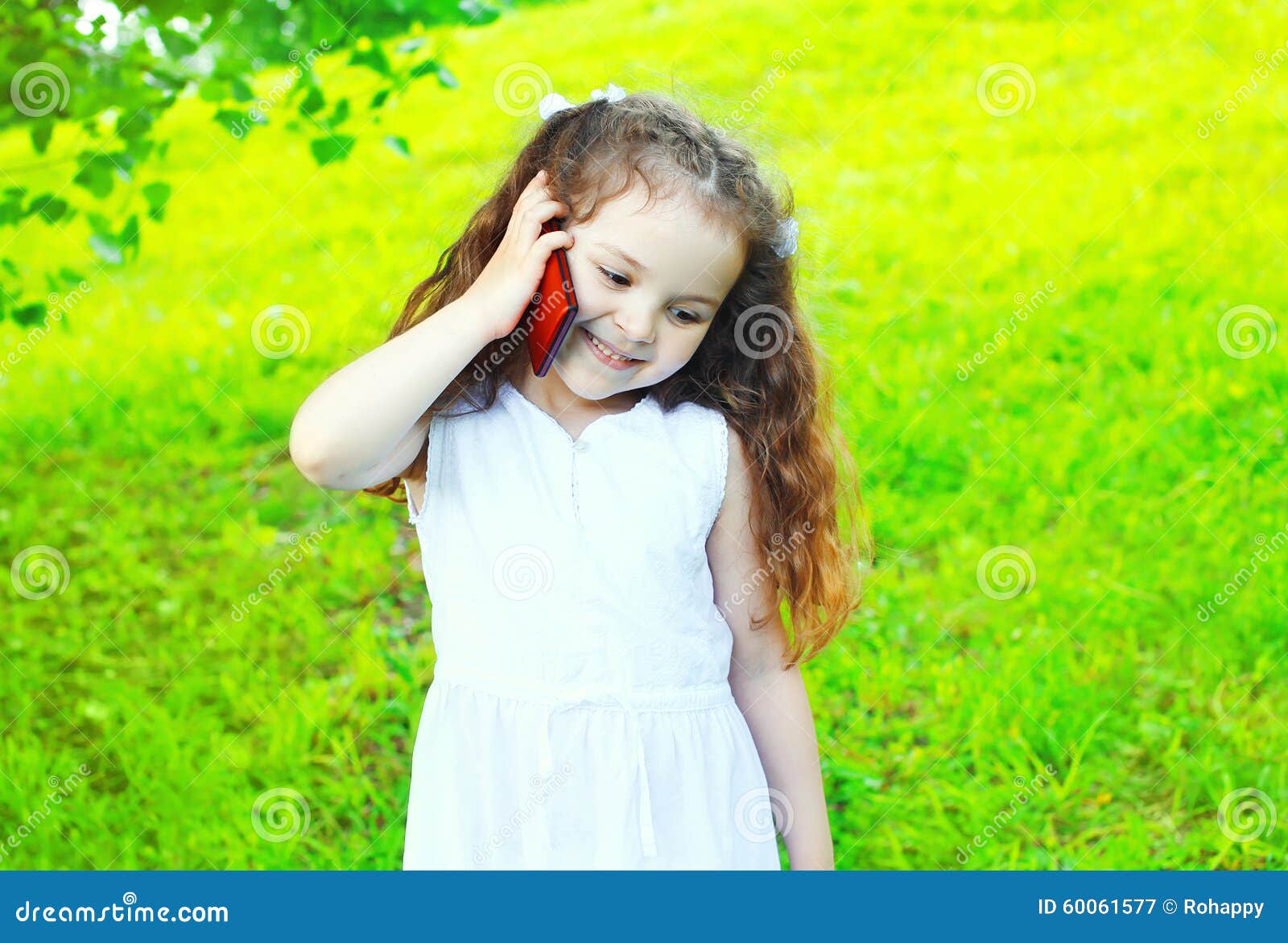 Happy Smiling Child Talking on Smartphone in Summer Stock Image - Image ...