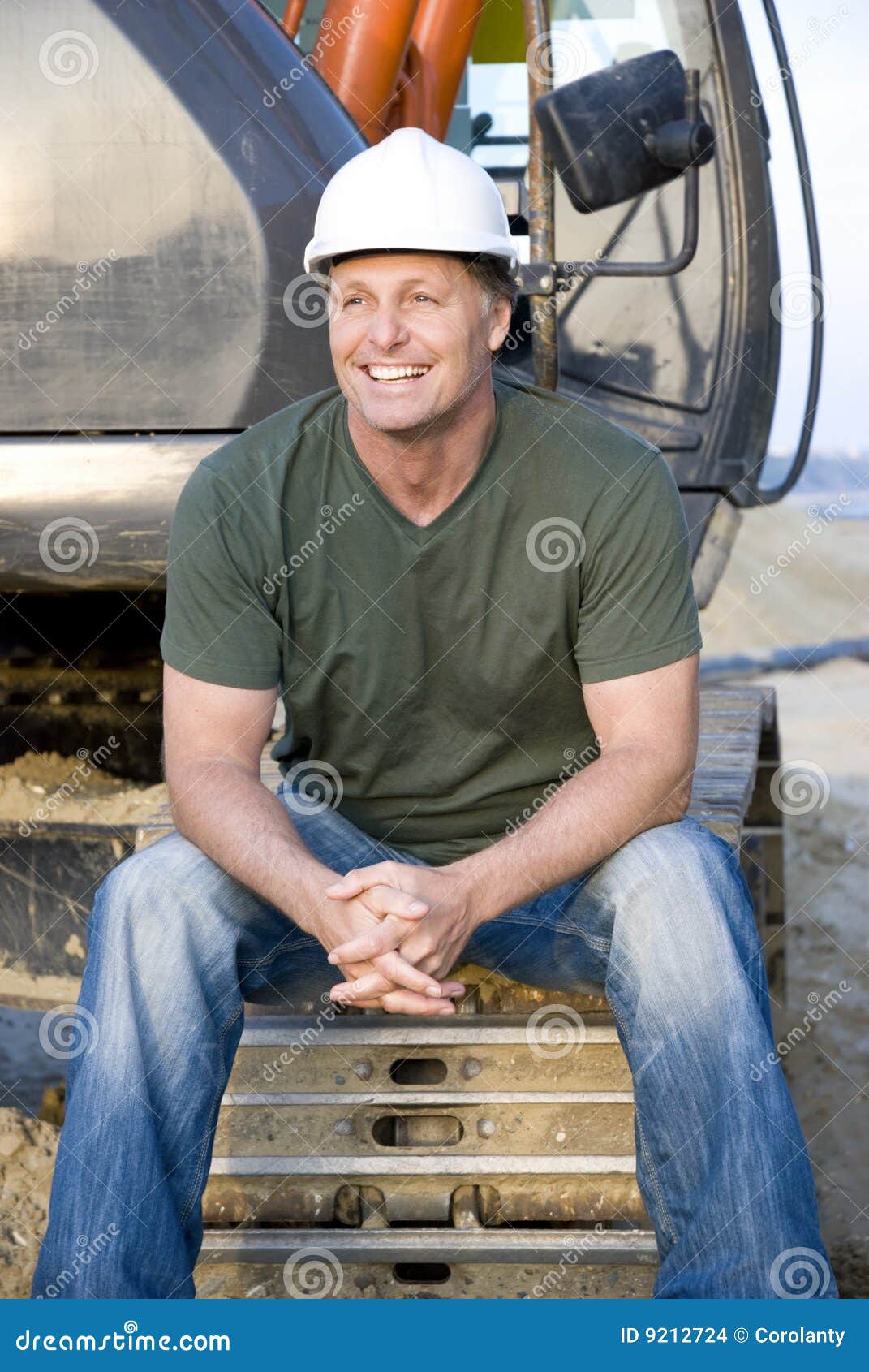 Smiling Construction Worker Is Standing With Shovel. Front View. Studio ...
