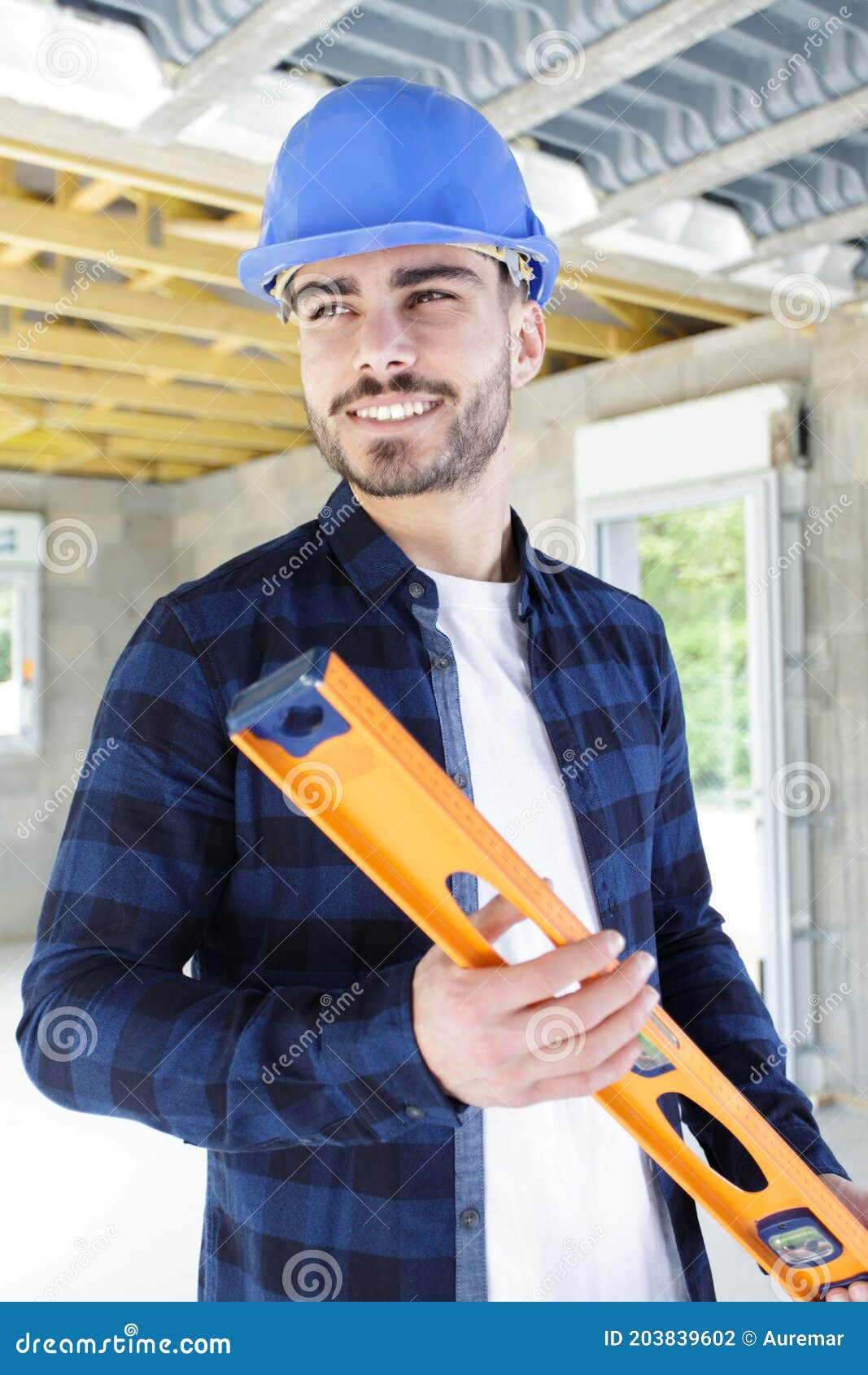 Happy Smiling Constructor Holding Construction Level Stock Photo ...