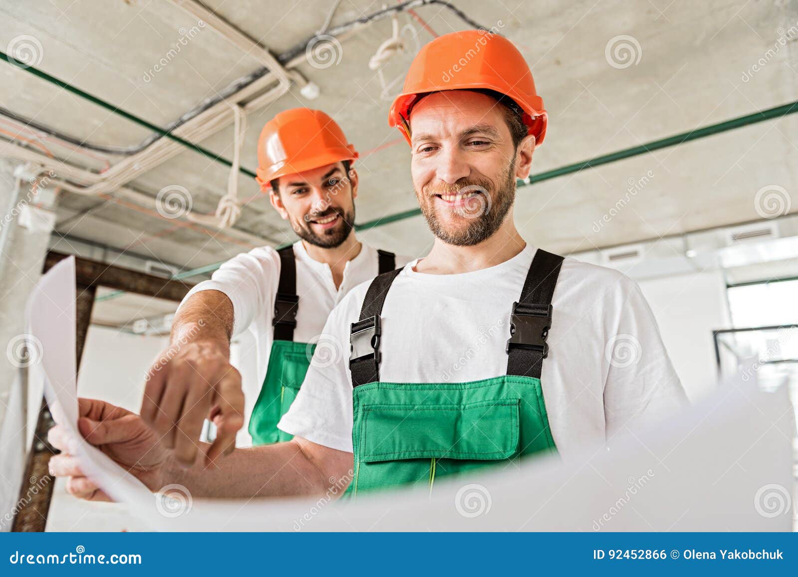 Happy Smiling Constructors Keeping Plan Stock Photo - Image of draft ...