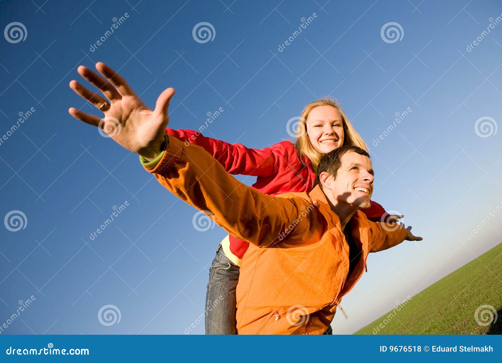 Happy Smiling Couple Fly in Sky Stock Photo - Image of girl, freedom ...