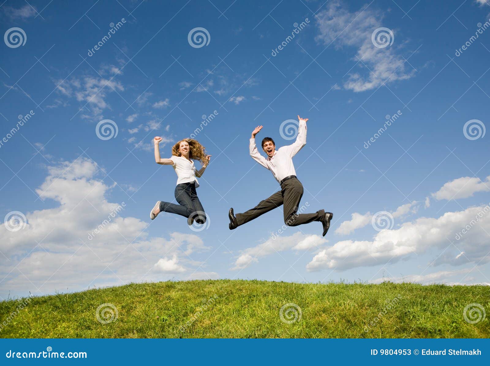 Happy Smiling Couple Jumping in Blue Sky Stock Image - Image of happy ...