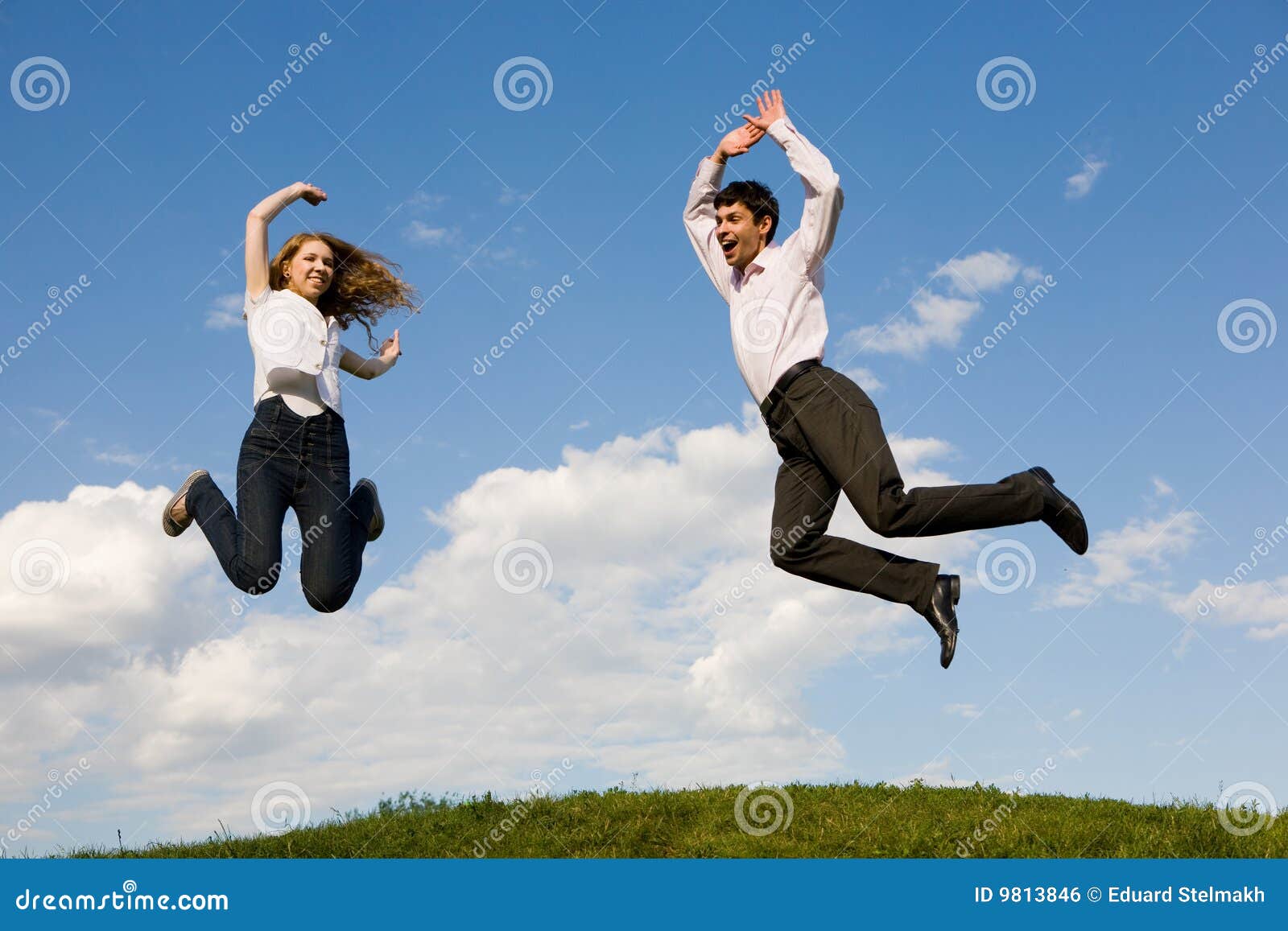 Happy Smiling Couple Jumping in Blue Sky Stock Photo - Image of couple ...