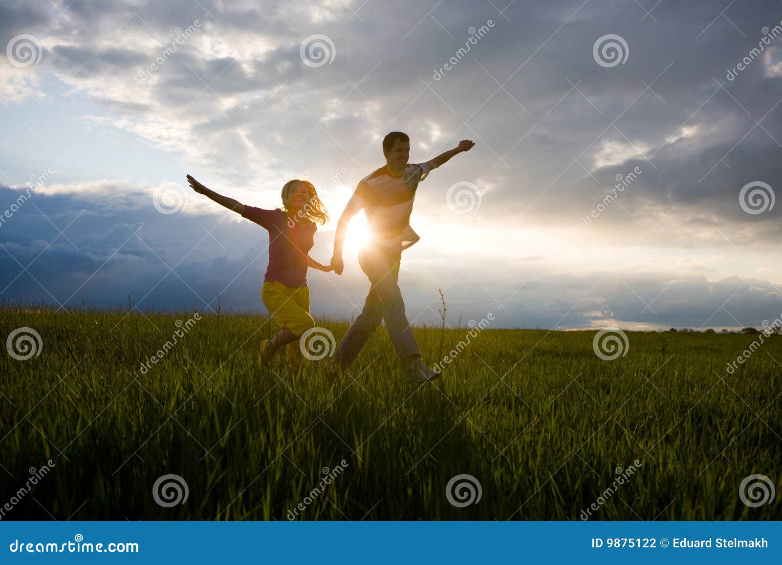 Happy Smiling Couple Run on the Field Stock Photo - Image of meadow ...