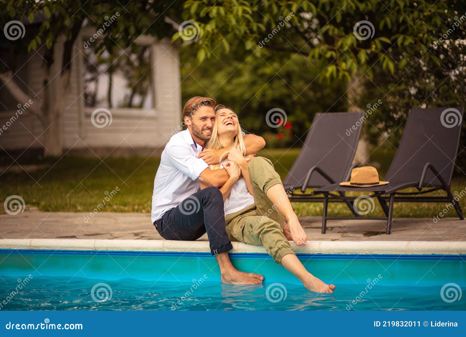 Happy Smiling Couple Sitting by the Pool Stock Image - Image of ...
