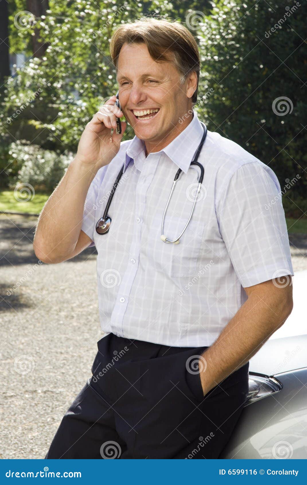 A happy smiling doctor stock photo. Image of practitioner - 6599116