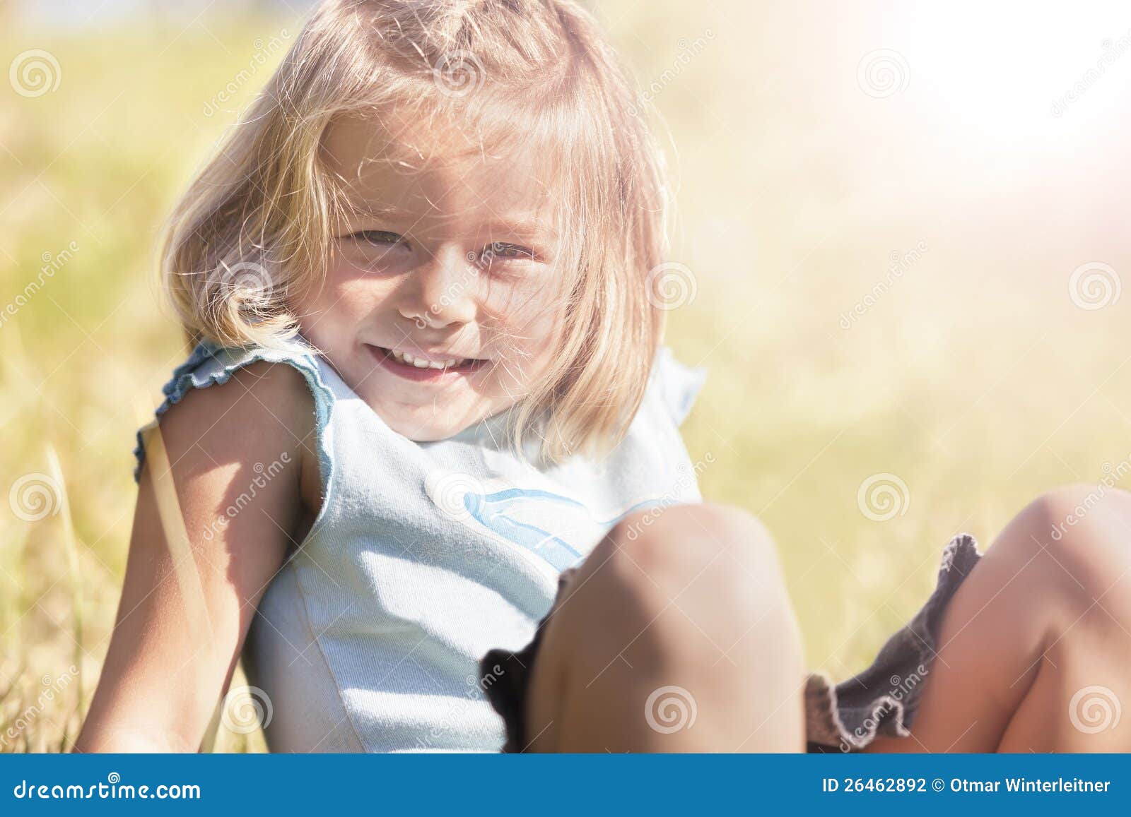 Happy Smiling Girl Sitting in Grass Stock Photo - Image of beautiful ...
