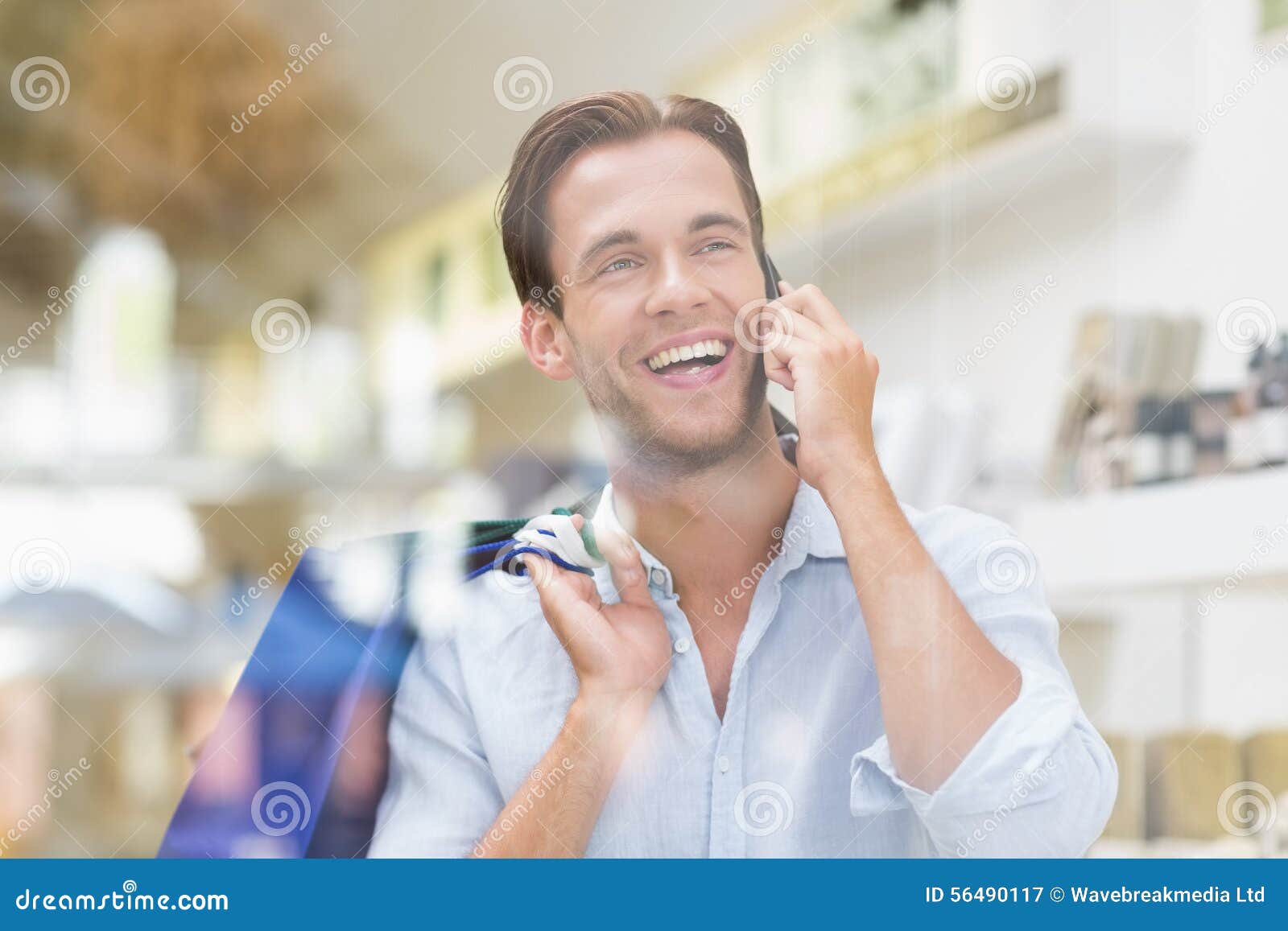 A Happy Smiling Man Calling Stock Image - Image of indoors, clothing ...
