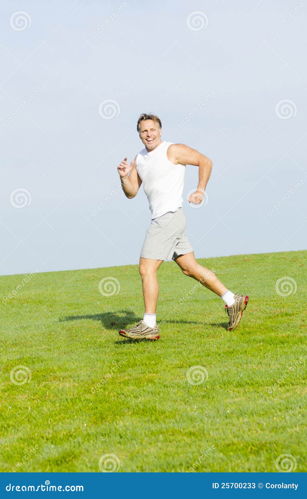 Happy smiling man running. stock image. Image of person - 25700233