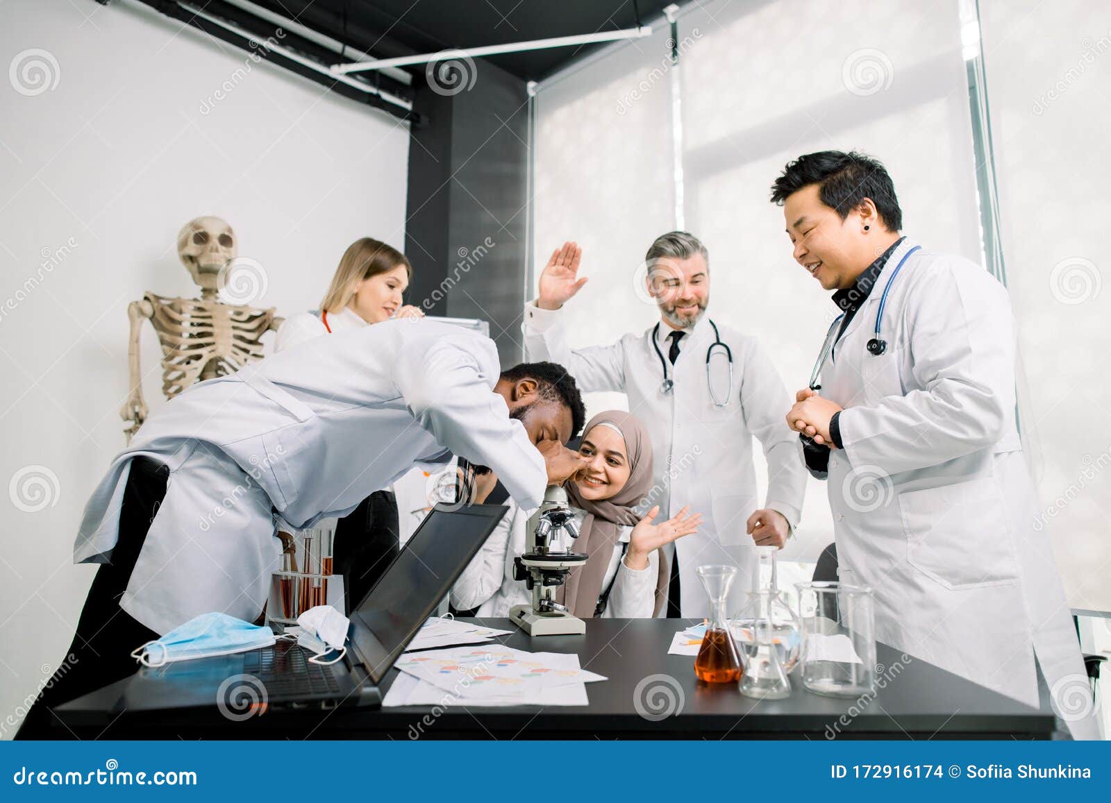 Happy Smiling Multiethnic Scientists are Clapping Hands after ...