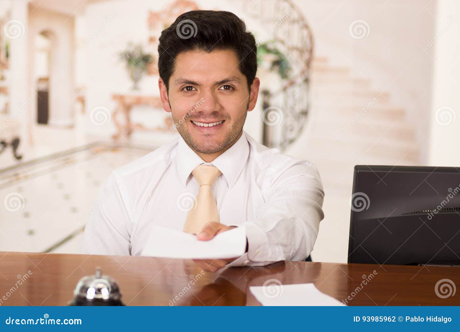 Happy Smiling Receptionist in Hotel Looking Friendly for the Guests in ...